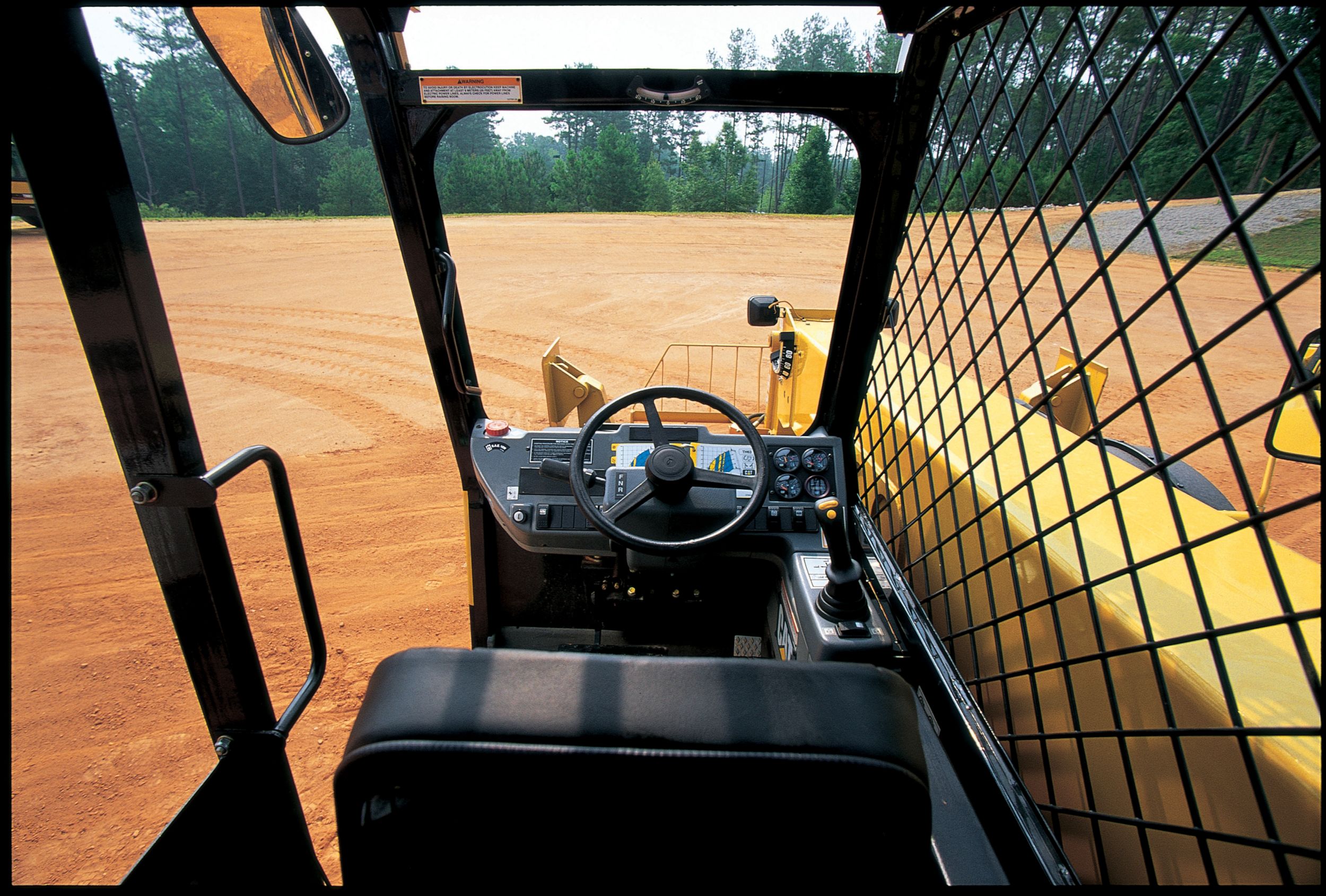 Cat TH62 Telehandlers | Caterpillar