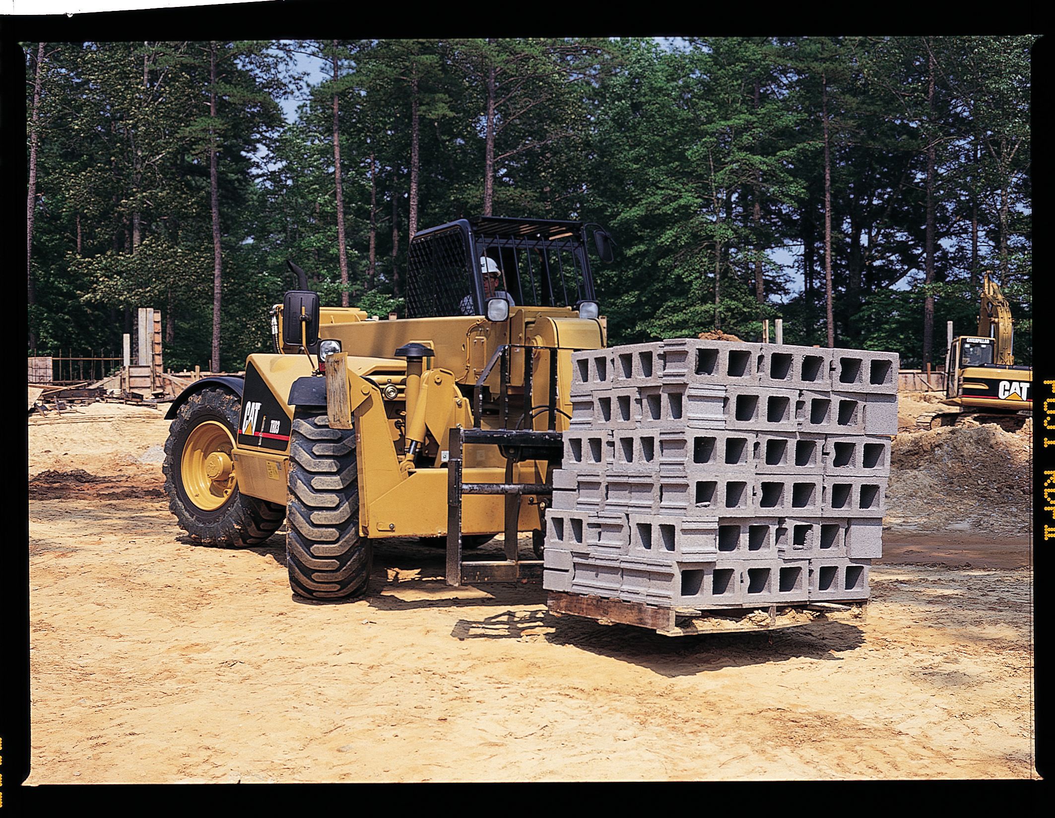 Cat TH83 Telehandlers | Caterpillar