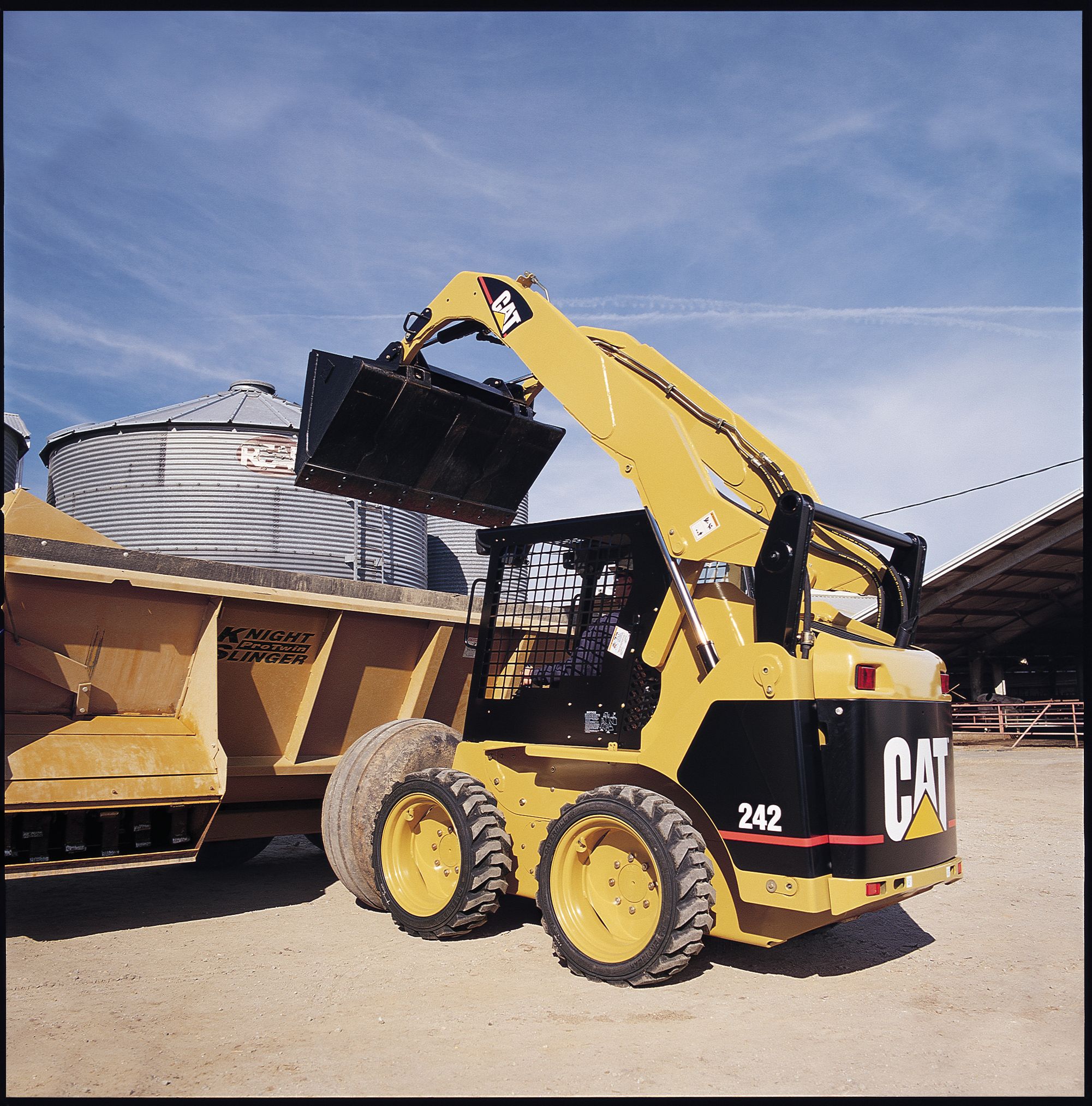 Cat 242 Skid Steer Loaders | Caterpillar