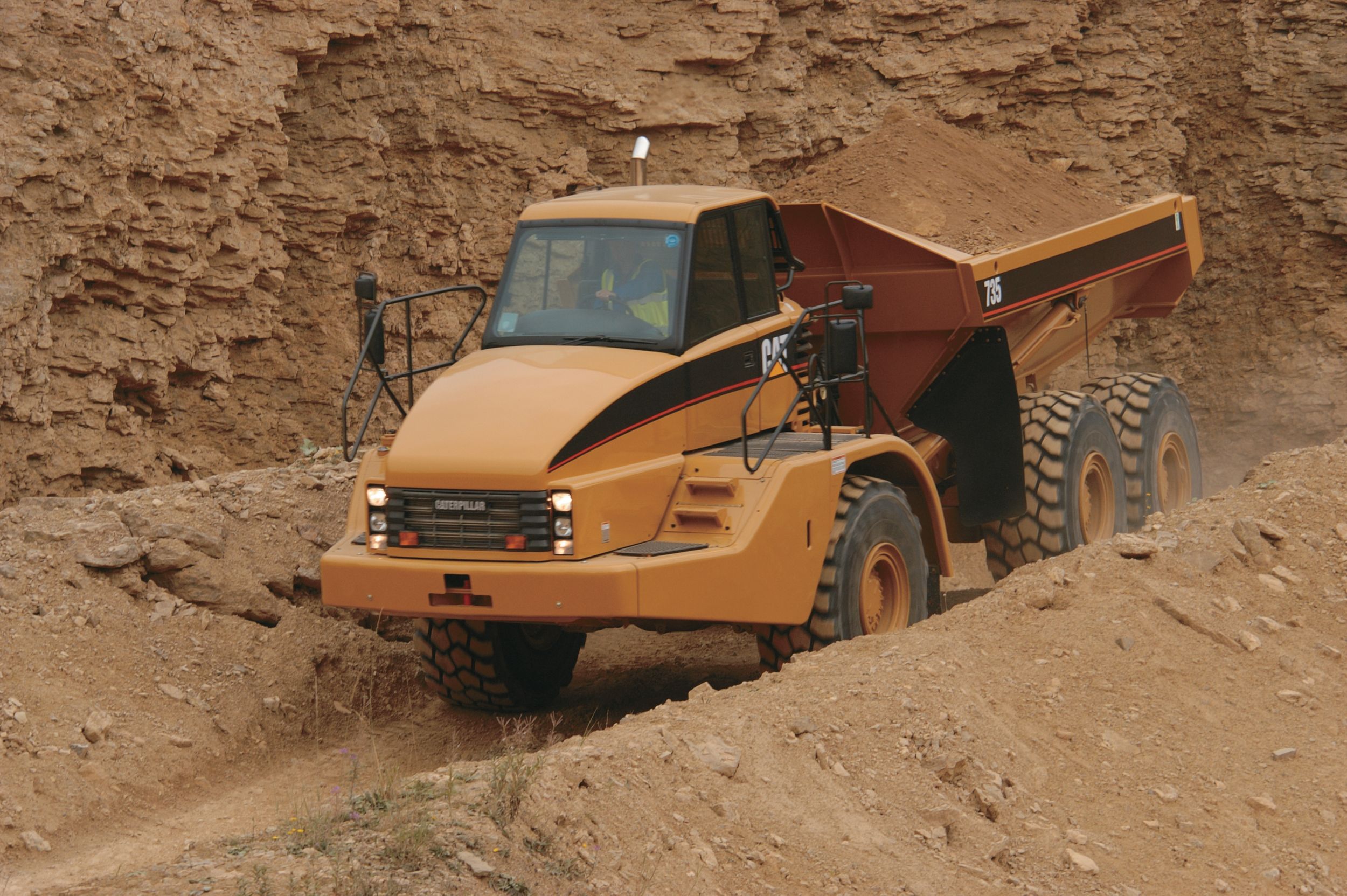 Cat 735 Three Axle Articulated Trucks | Caterpillar