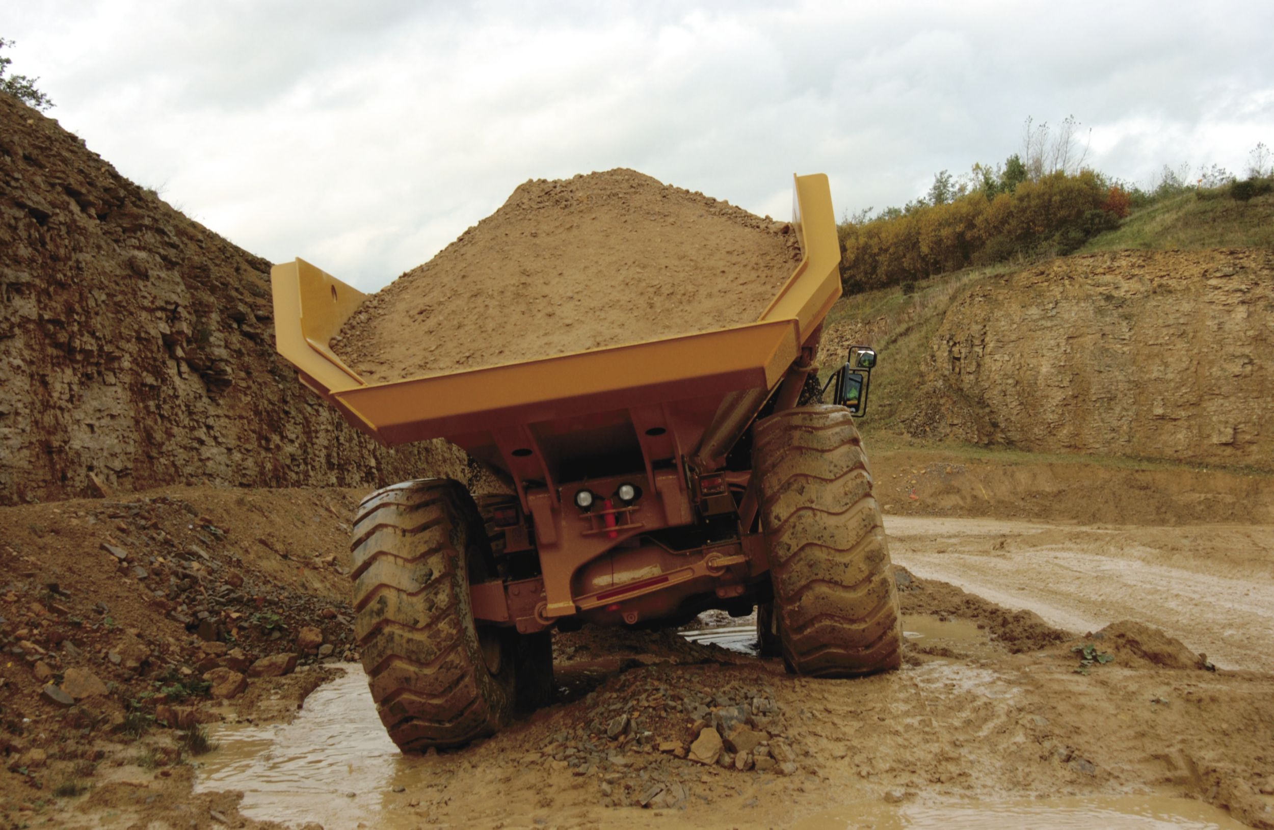 Cat 725 Three Axle Articulated Trucks | Caterpillar