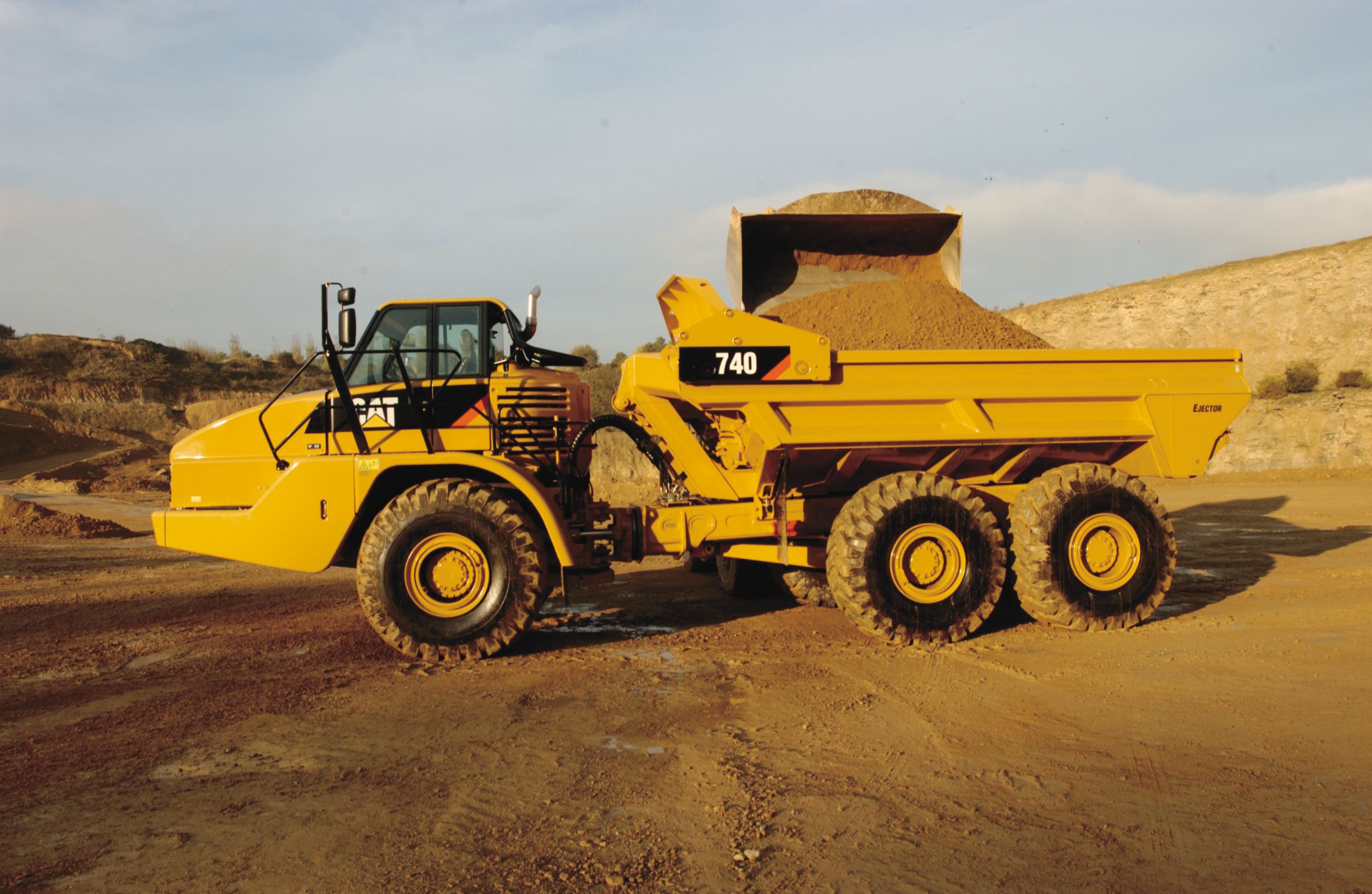 Cat 740 Ejector Three Axle Articulated Trucks | Caterpillar