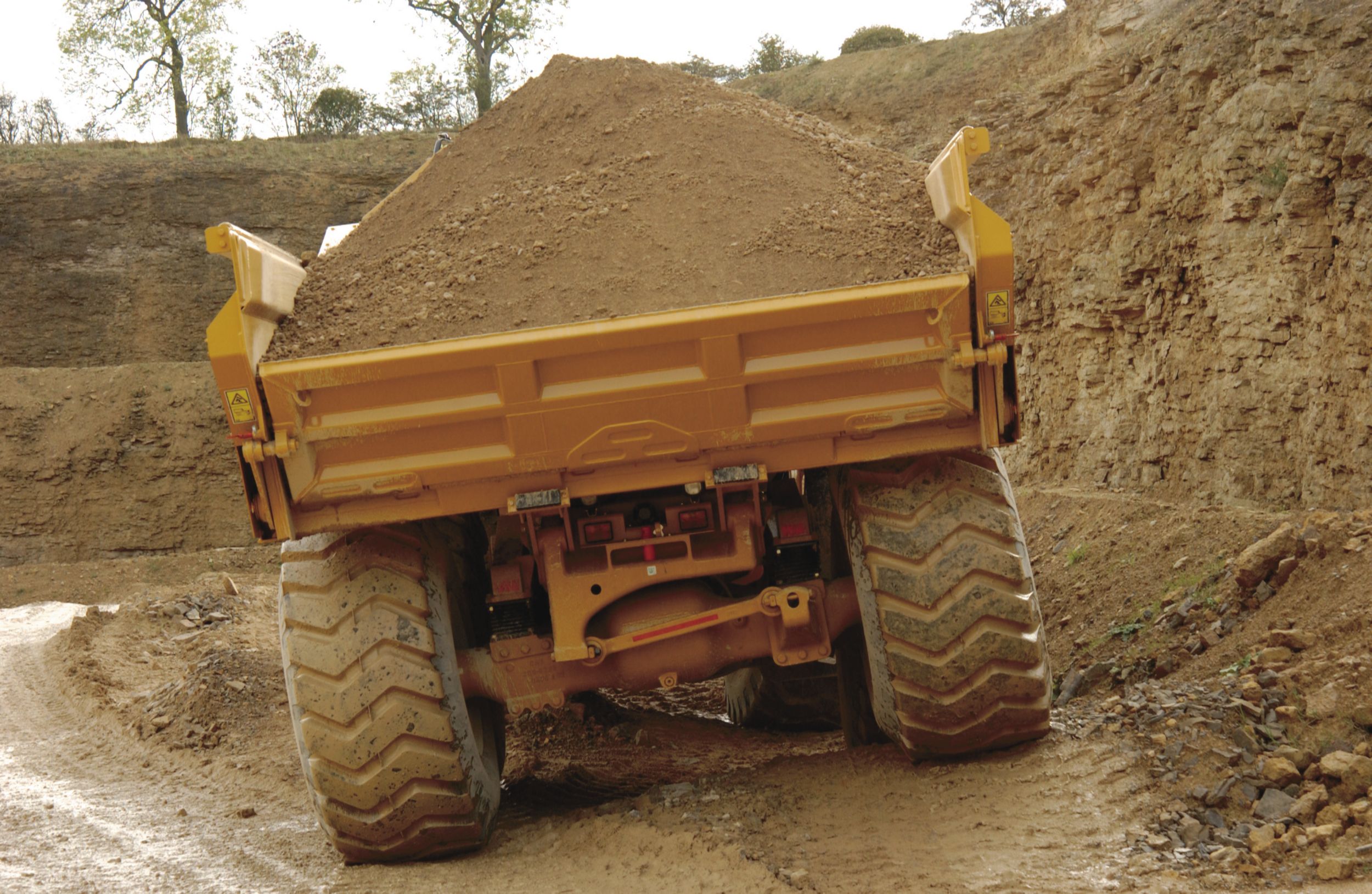 Cat 740 Ejector Three Axle Articulated Trucks | Caterpillar