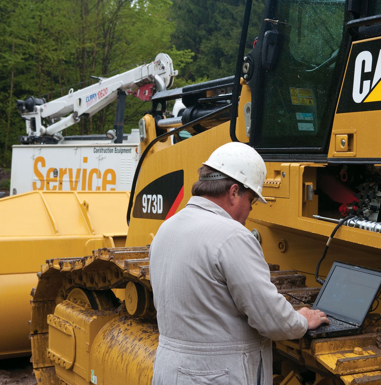 Cat 973D WH Cargadores de cadenas de manipulación de basura | Caterpillar