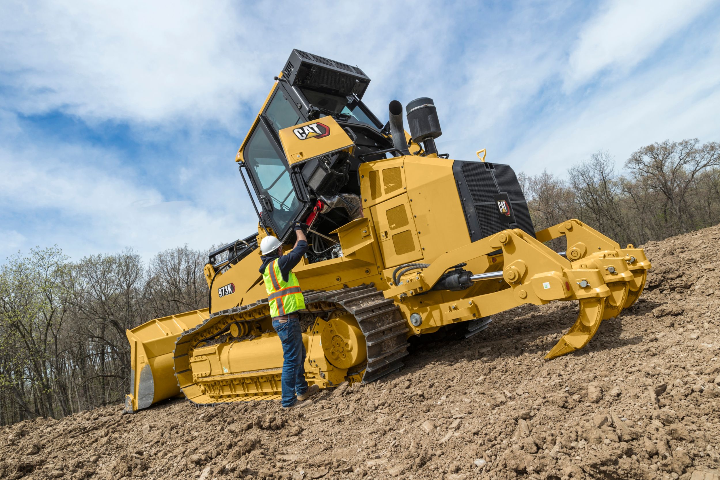 Cat 973K WH 廃棄物処理トラックローダ | Caterpillar