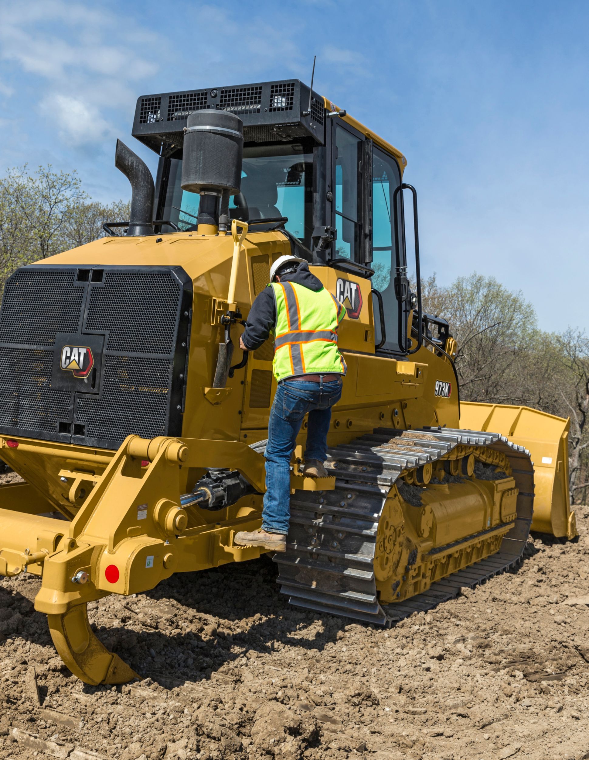 Cat 973K WH 廃棄物処理トラックローダ | Caterpillar