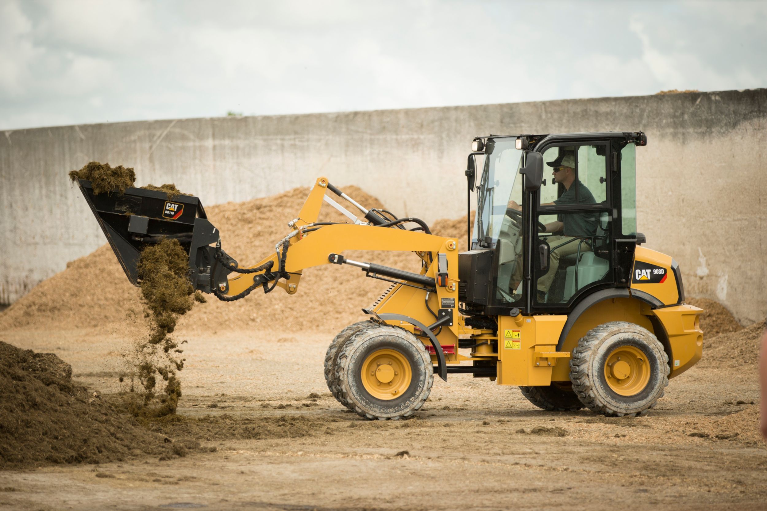Cat® 903d Compact Wheel Loader Delivers Increased Performance Expanded Work Tool Capability And