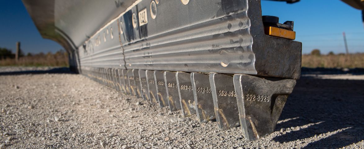 Cutting Edges & Bit Systems for Motor Graders | Cat | Caterpillar