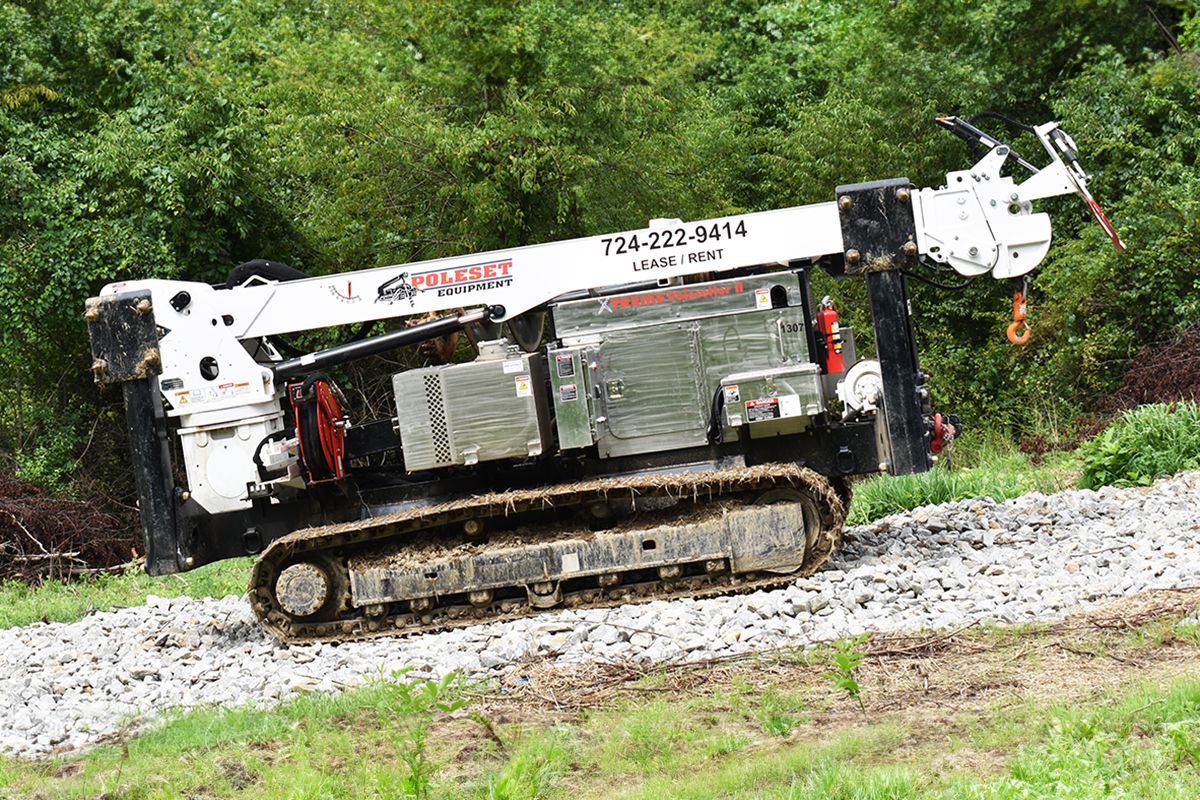 Xtreme Polesetter II Digger and Bucket | Cat | Caterpillar