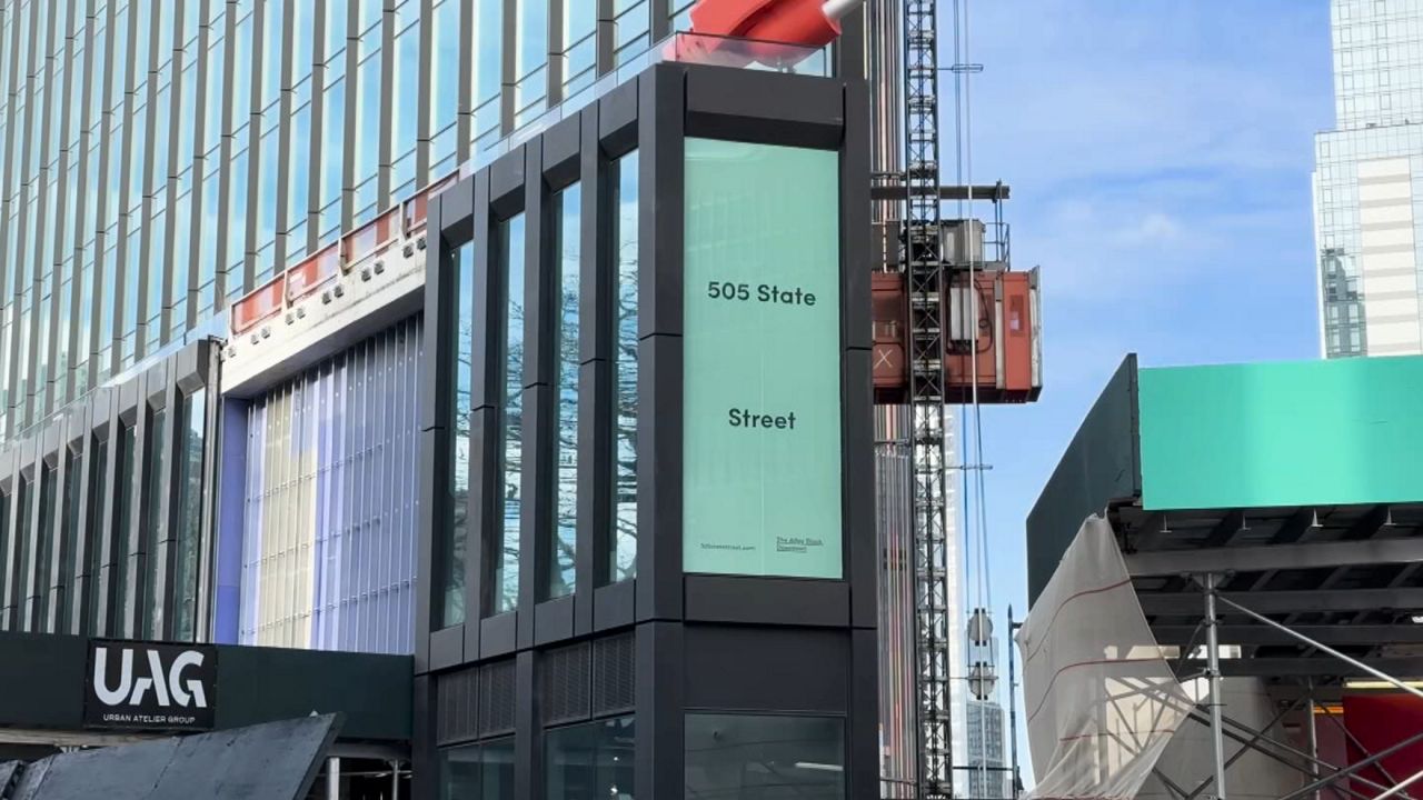 All-electric building set to open amid new emission laws
