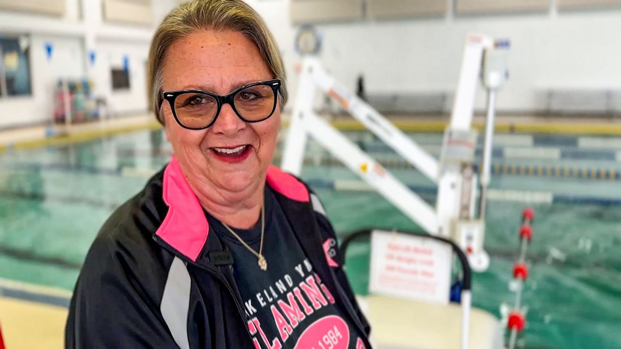 Lorraine Valerino coaches synchronized swim team