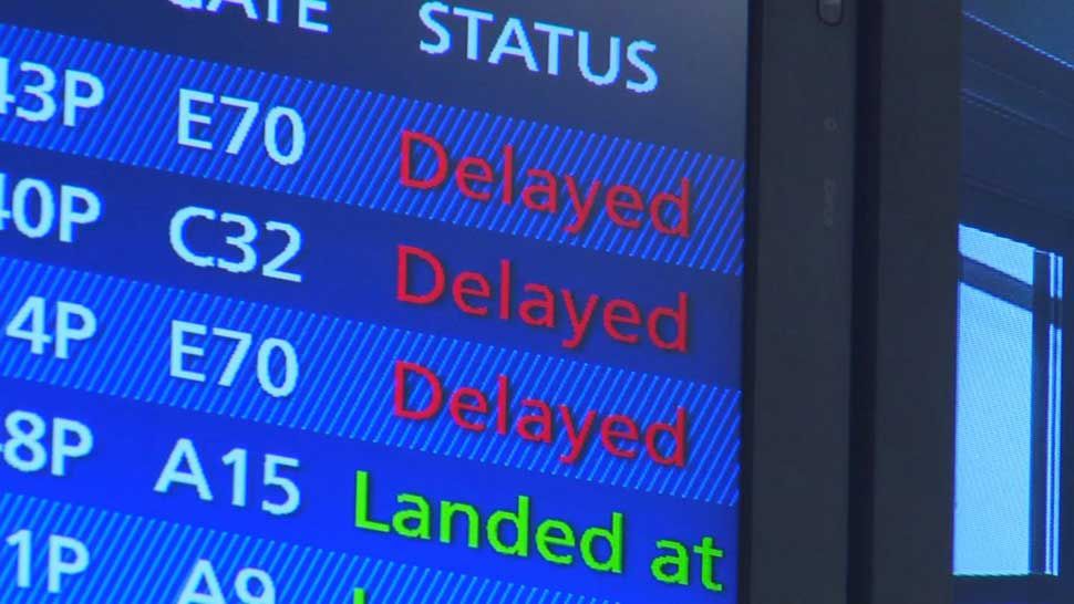 extreme cold weather flight delays cancellations nationwide