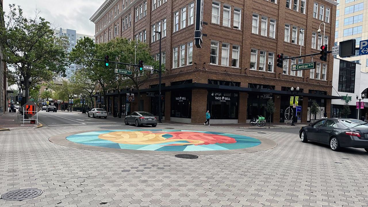 Asphalt mural adds safety, art to downtown Orlando