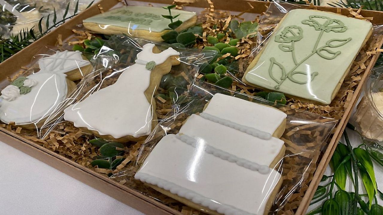 Hundreds walk down aisle of Cleveland Bridal Show