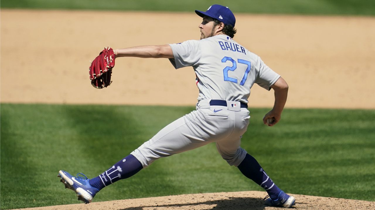 Dodgers Blow Late Lead, Hand A's First Win