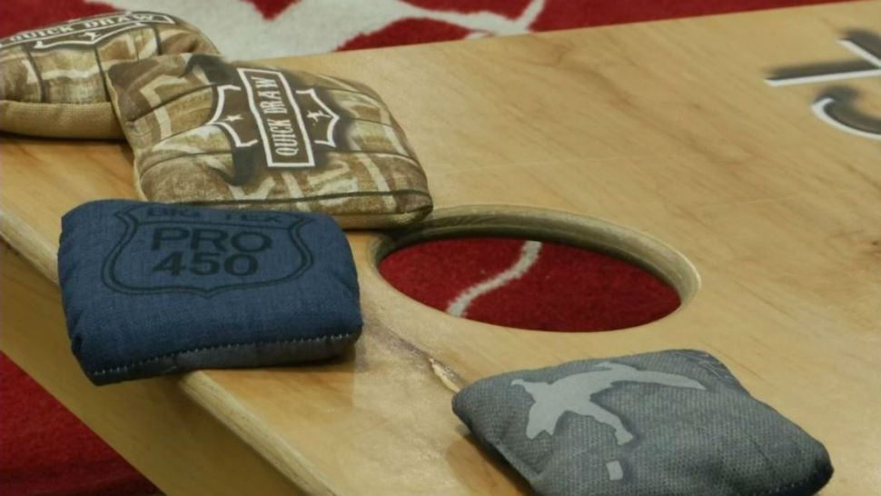 Hundreds face off in local cornhole tournament