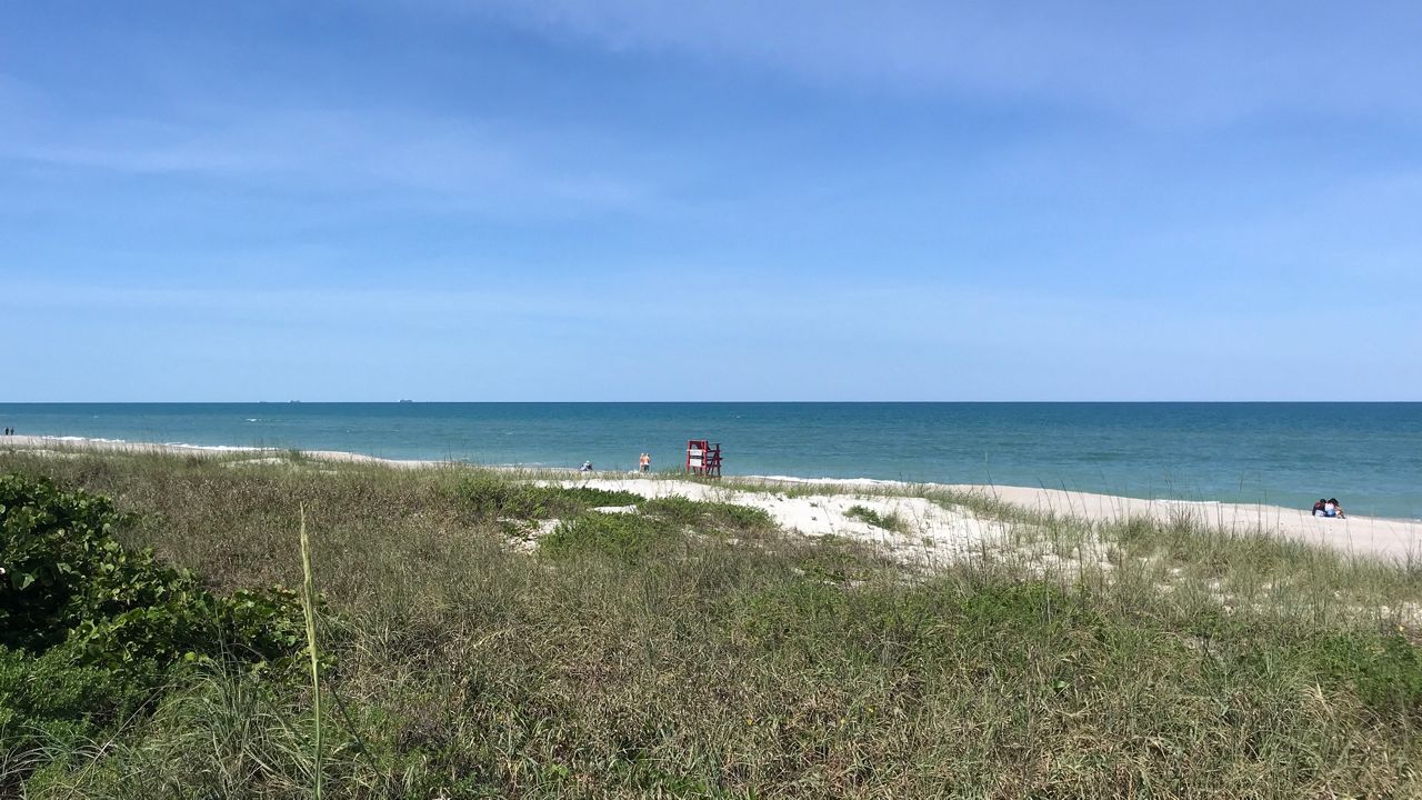 Brevard Cities Lift Beach Ban on Sunbathing, Group Activity