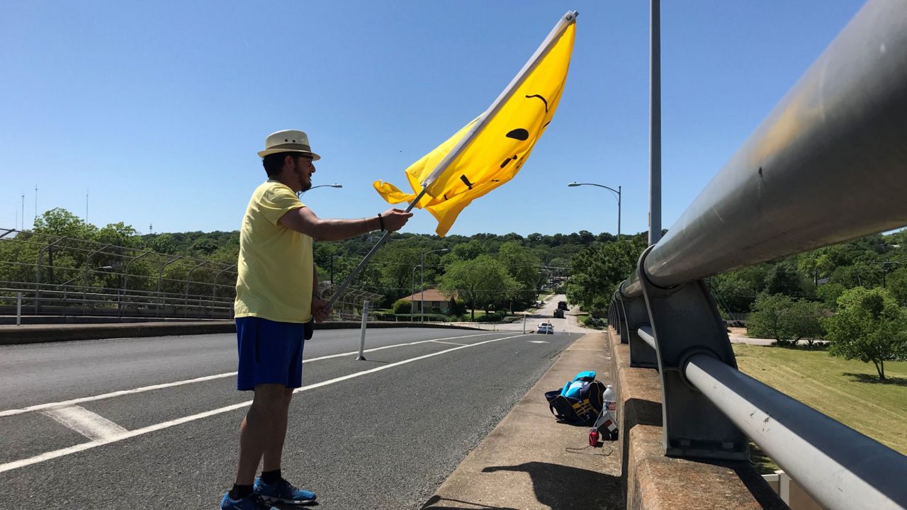 Austin Man Waves Flags for Hours Just to Make People Smile