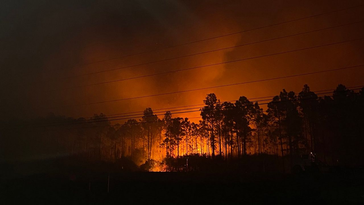 Hundreds evacuated as wildfires rage in Florida Panhandle