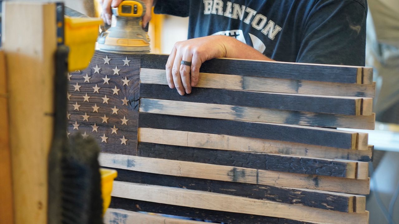 Booming business: Veterans build wooden flags