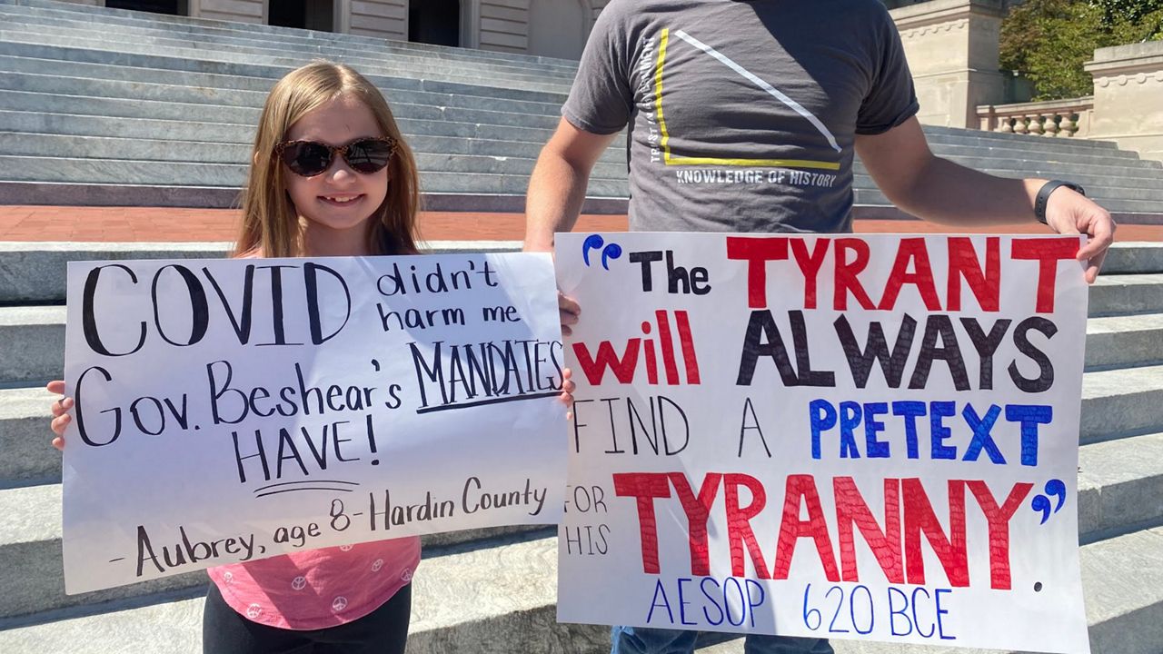 Mask mandate opponents and supporters gather in Frankfort
