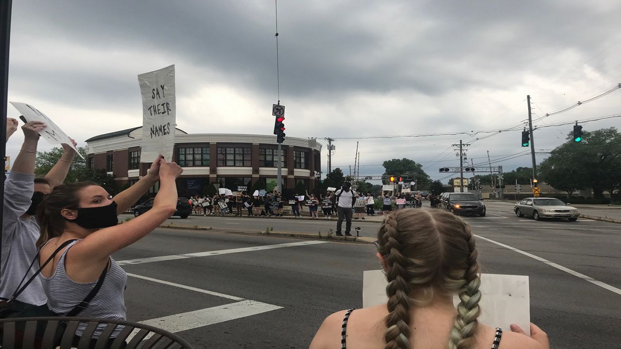 Protesters Continue Cause Even in the Rain