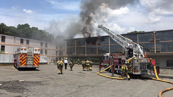 More than 40 firefighters respond to vacant hotel fire