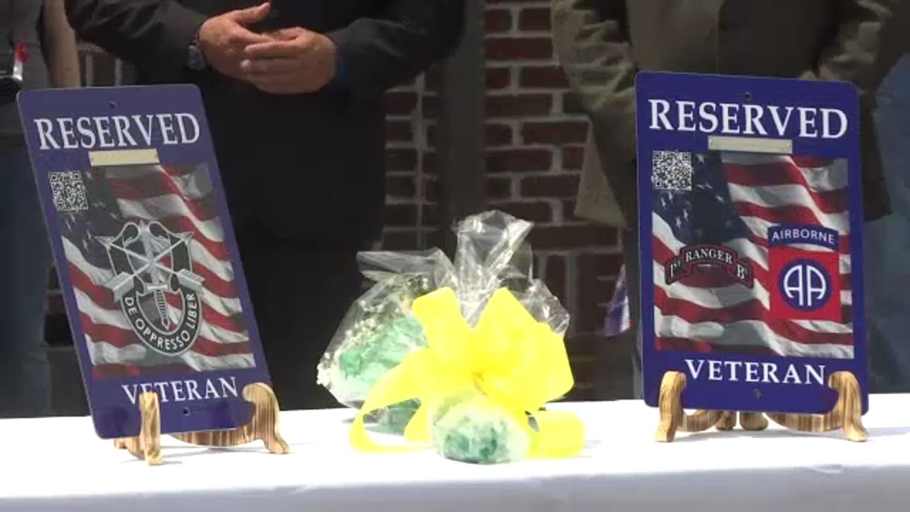 Parking sign dedication honors fallen soldiers