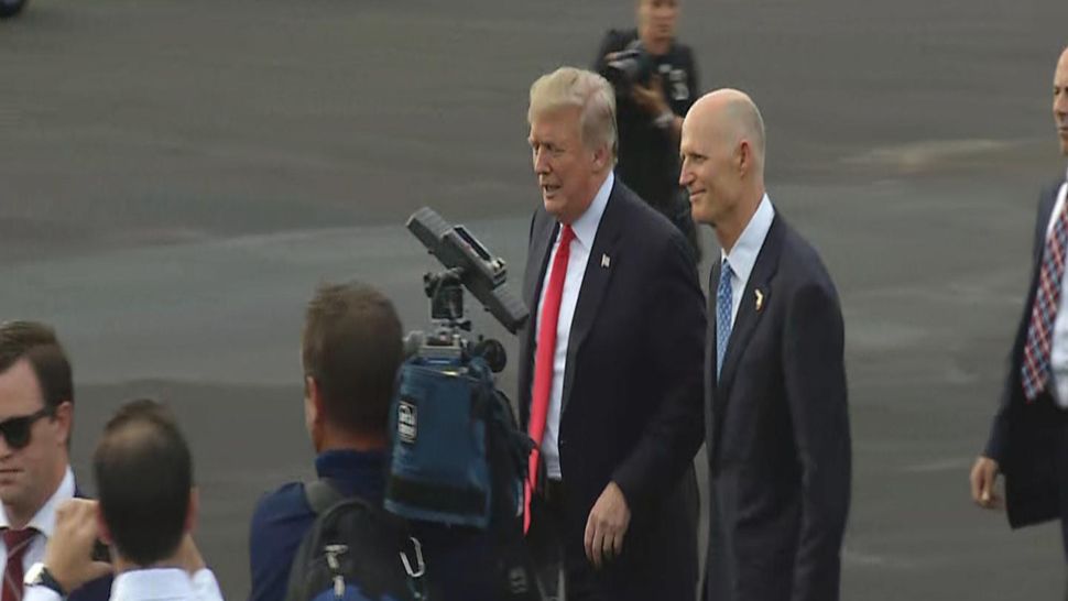 Gov. Scott treads the Trump effect carefully in Tampa