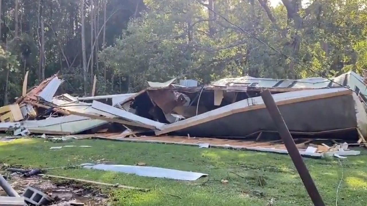 Isaias, again a tropical storm, spawns wild inland weather