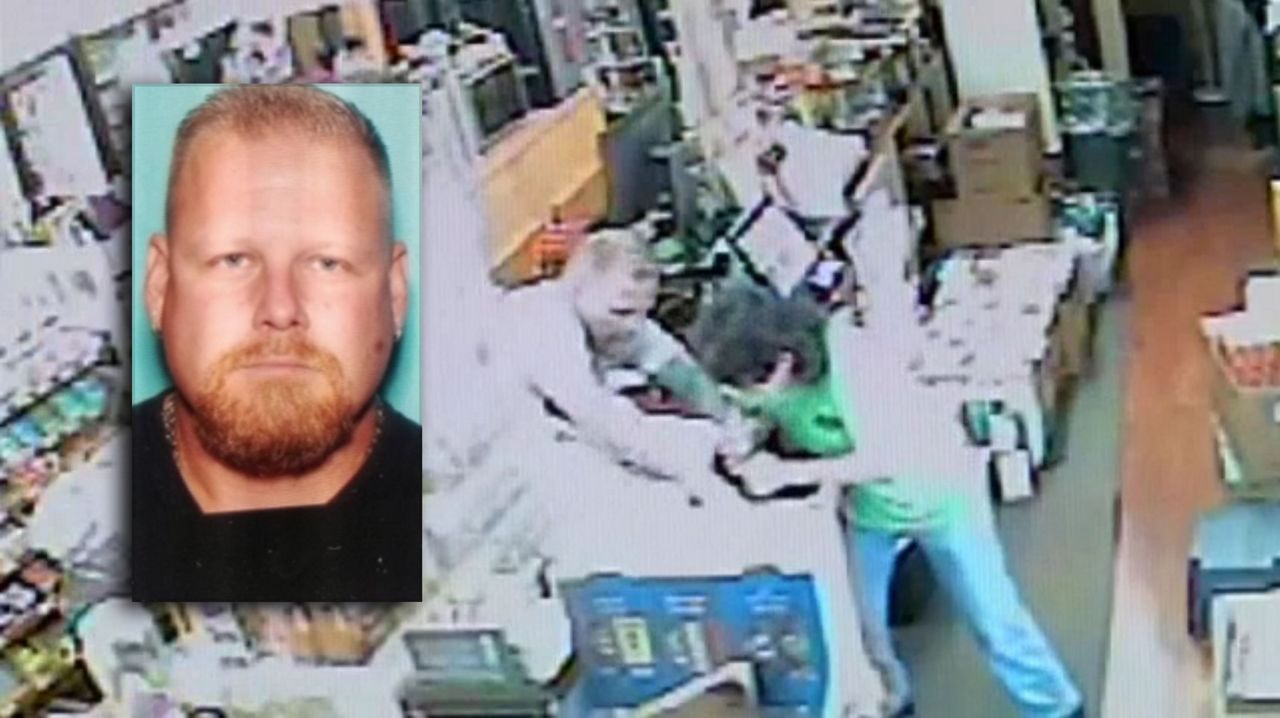 Clerk fights back against accused serial robber