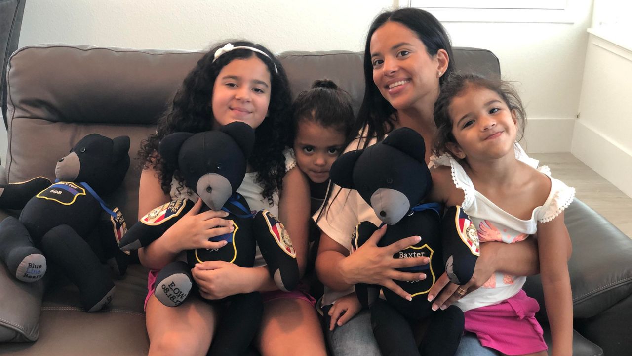 Daughters of Slain Kissimmee Officer Matthew Baxter