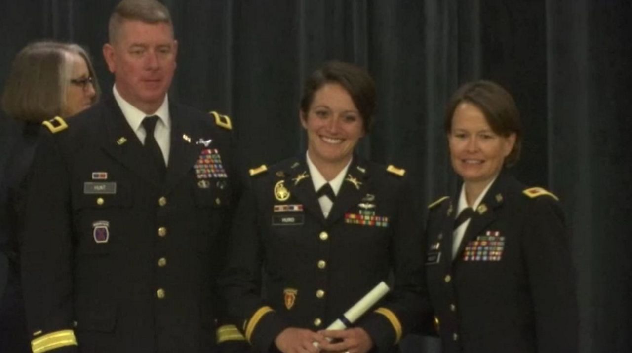 Officer promotion ceremony includes 2 women