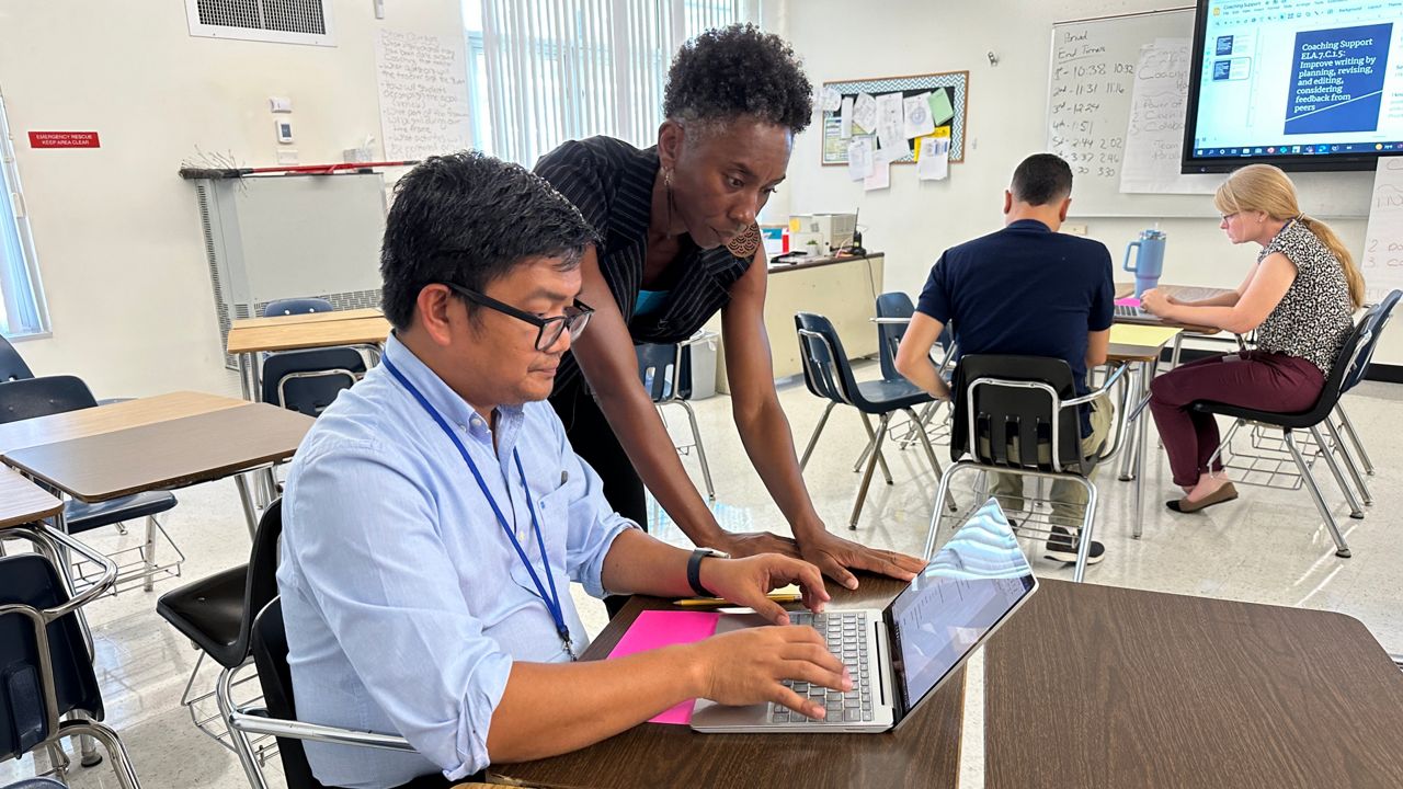 Adams Middle School principal teacher coaching sessions