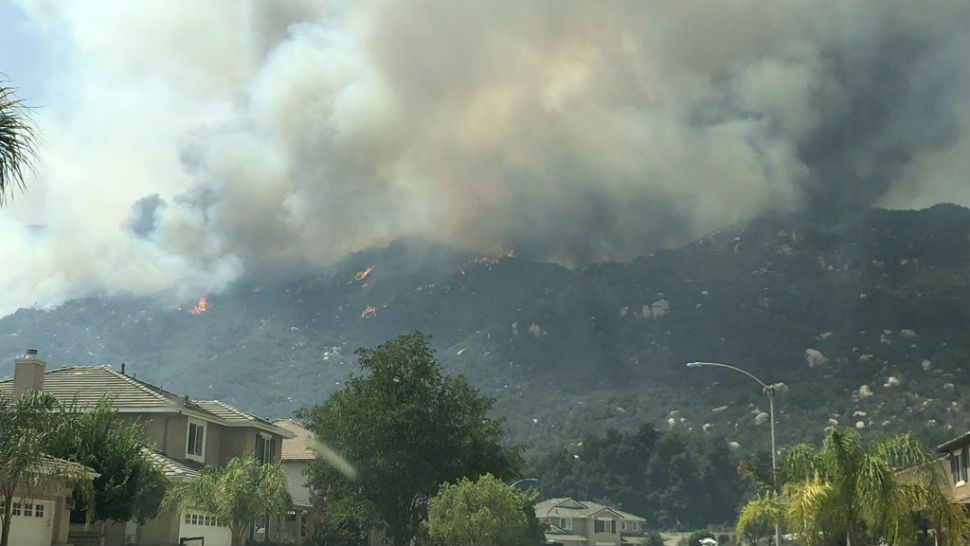 Firefighters Protecting Homes As 2,000-Acre Fire Continues to Burn