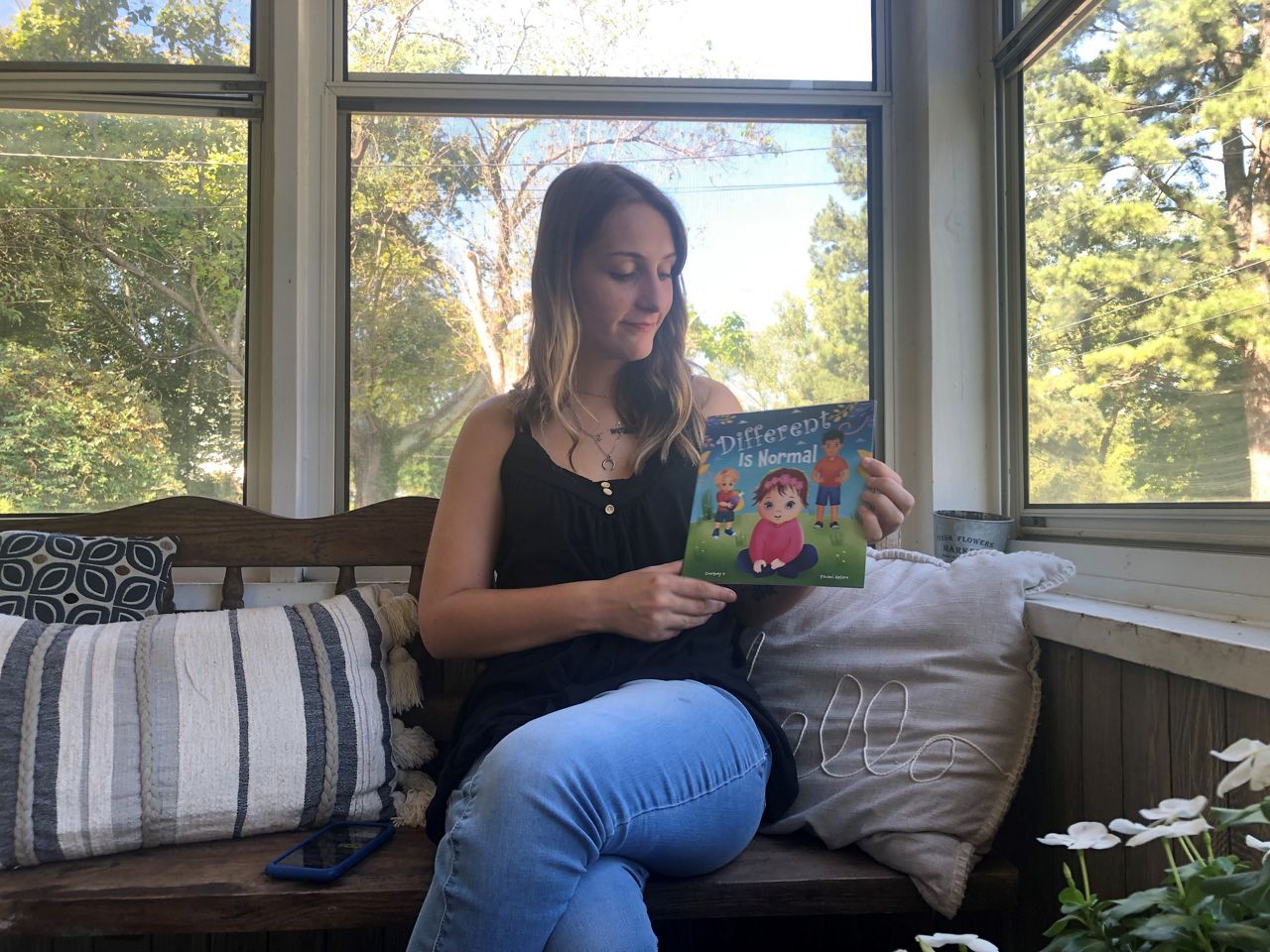 Young Author writing children's books with unique characters