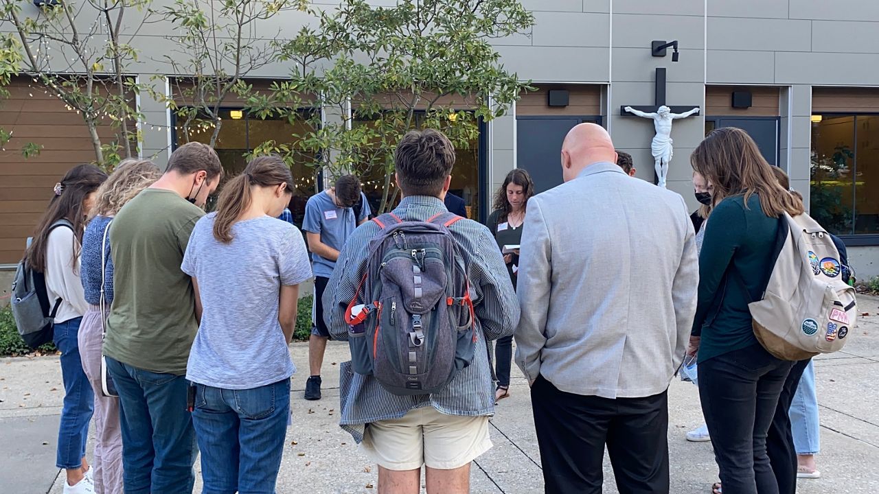 Catholic Newman Center holds vigil for Lofton Hazelwood