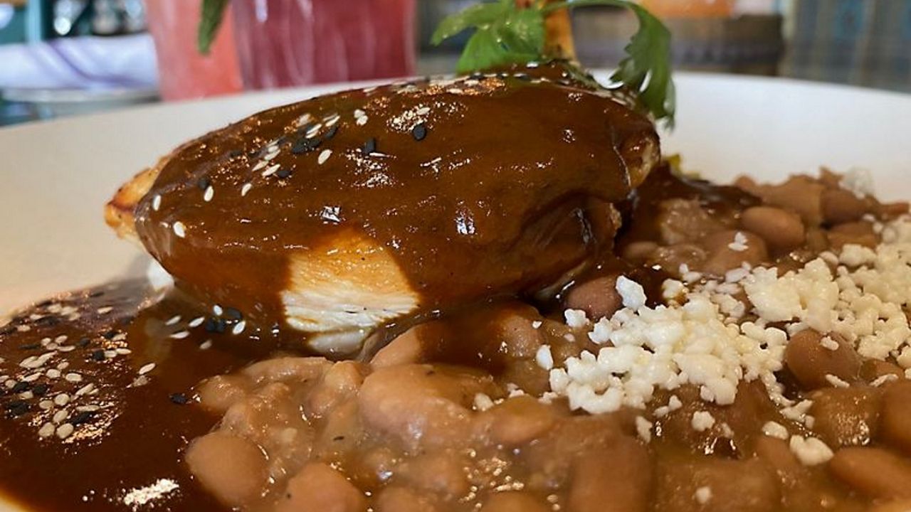 Los Amigos' chicken mole and pork carnitas