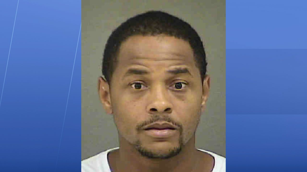 Suspect climbs on roof of business to avoid arrest