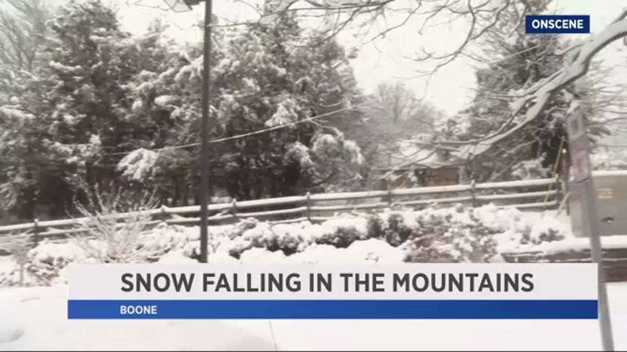 Snow falling in NC mountains, Charlotte area clear