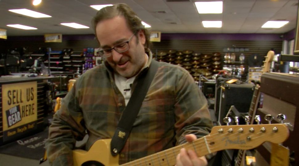 Former HBO Executive Trades in New Suits for Used Guitars