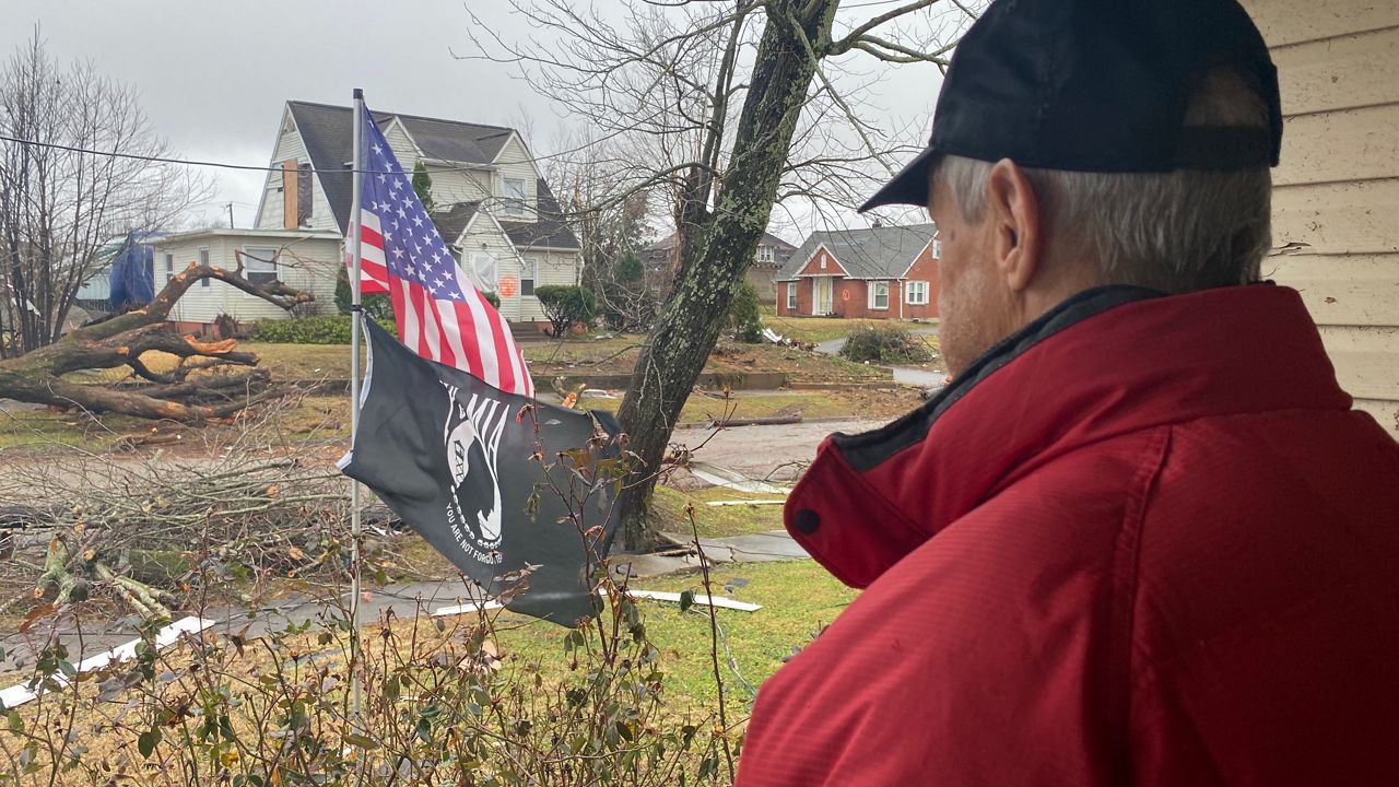 Terry Warren returns home to collect salvageable items