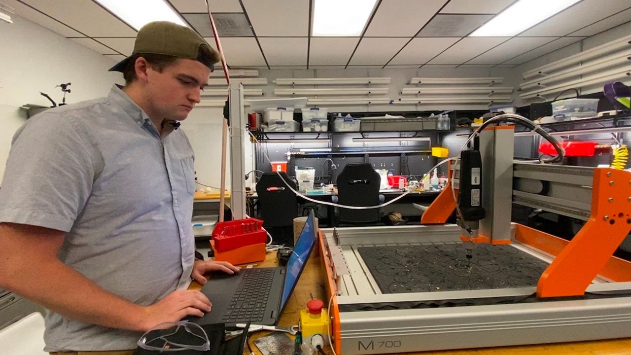 Mentors share robotics knowledge with Brevard students