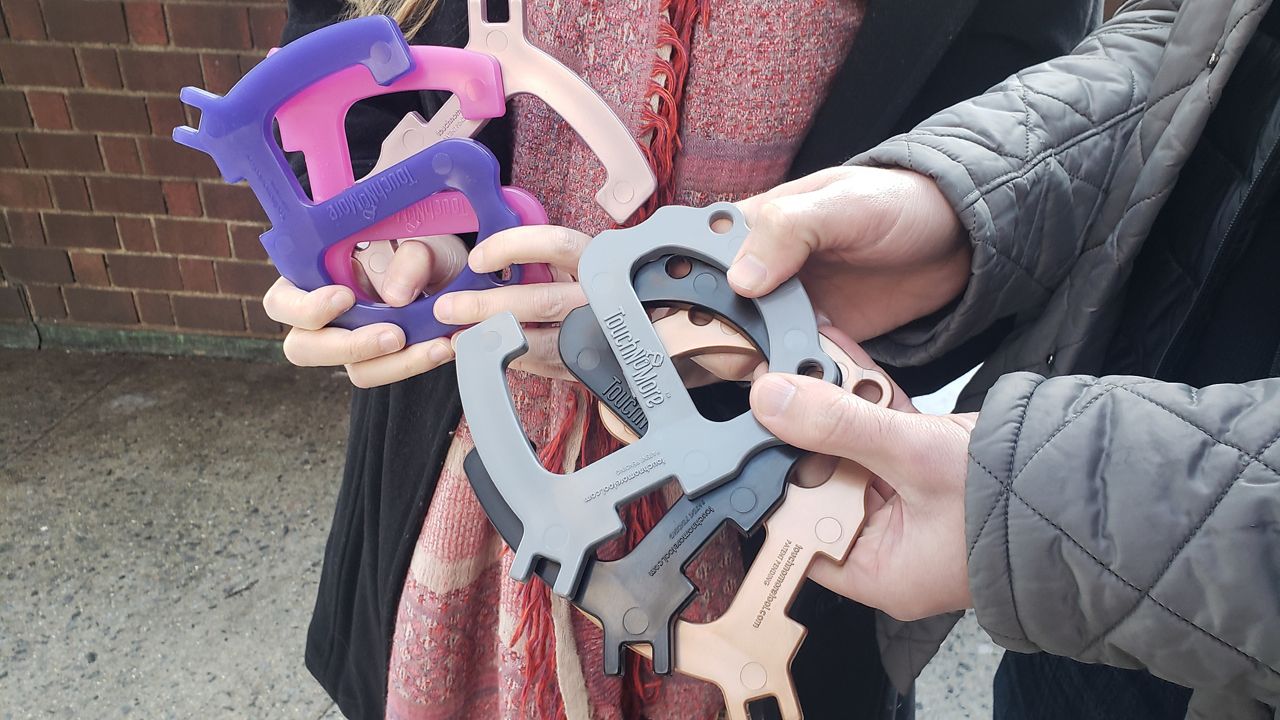 COVID Inspires No-Touch Subway Grip Invention for Subway Poles