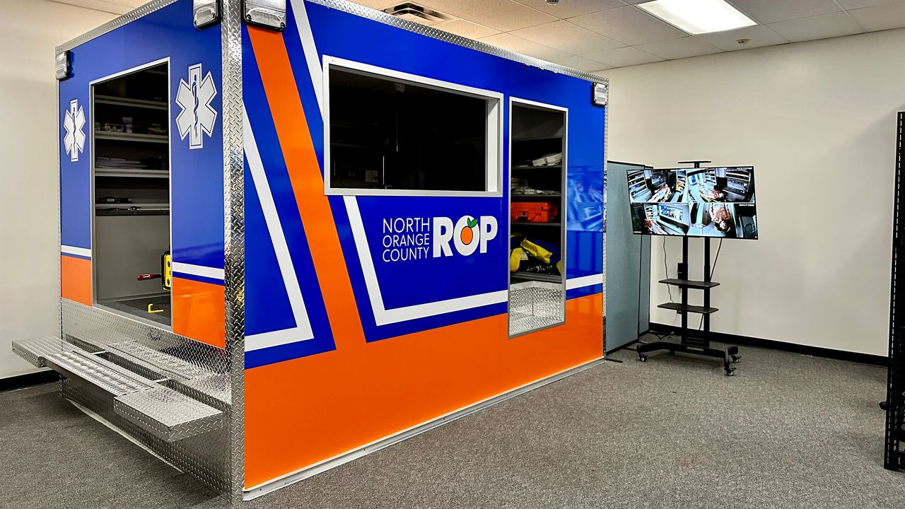 Students learn lifesaving skills in ambulance simulator