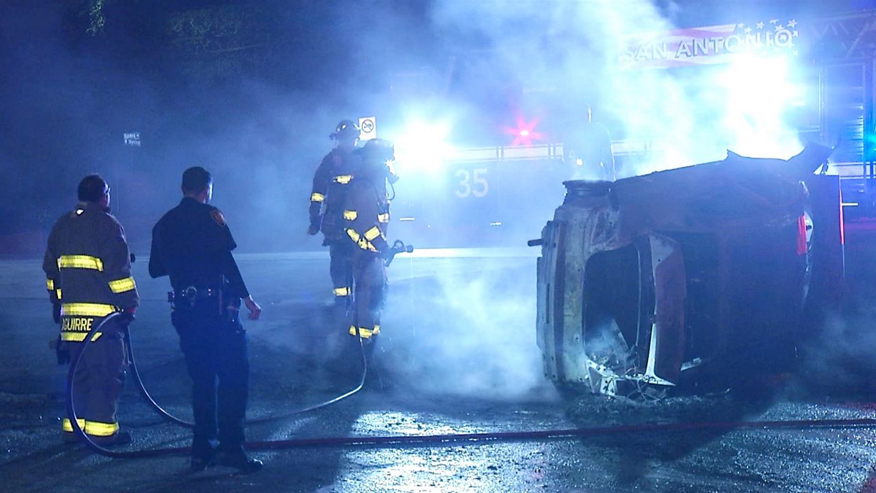Woman Rescued Before Car Burst into Flames