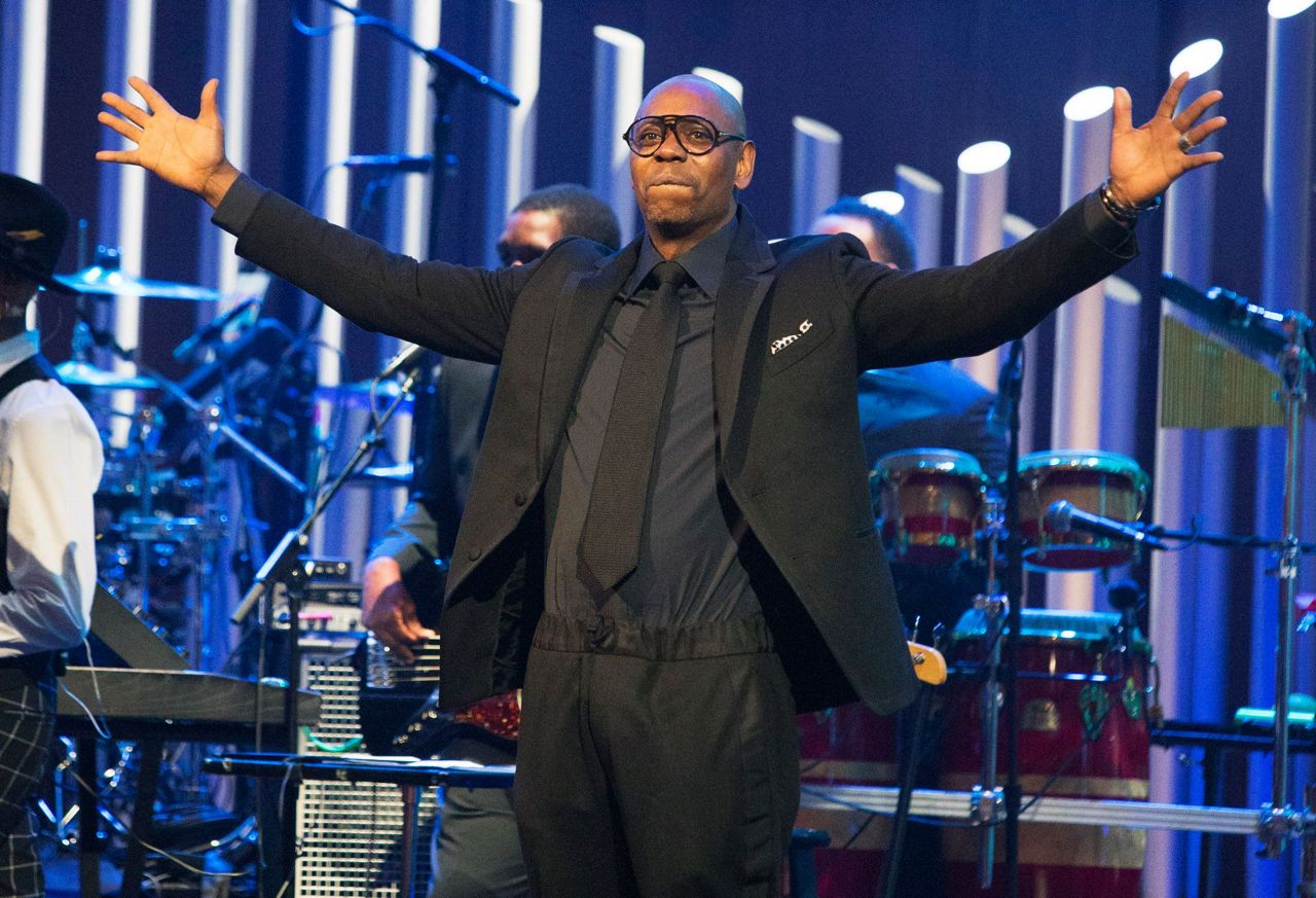 The Latest: Stand-up Chappelle credits DC for his talents