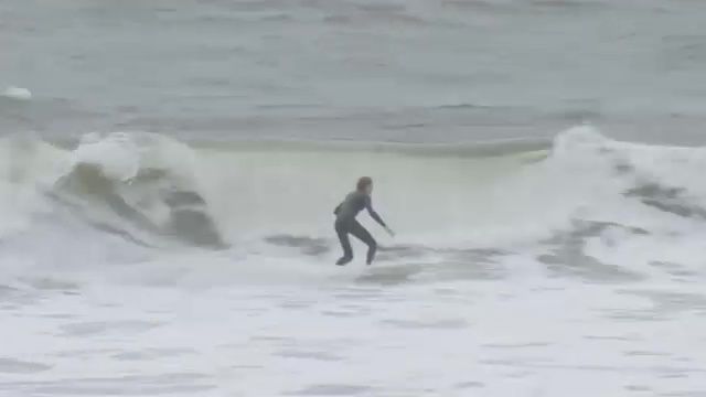 Surfers ride big waves Hurricane Florence sends to NYC