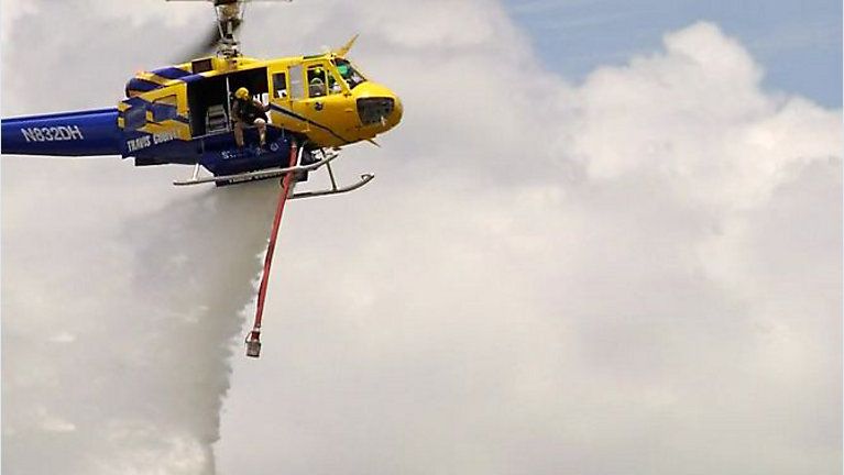 Crews fight brush fire in NW Travis County