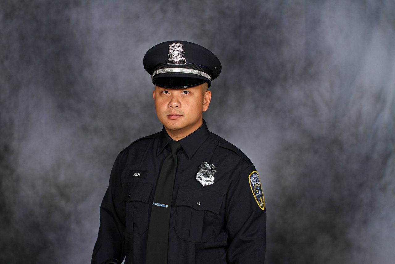 Family, Fellow Officers Honor Milwaukee Officer Kou Her
